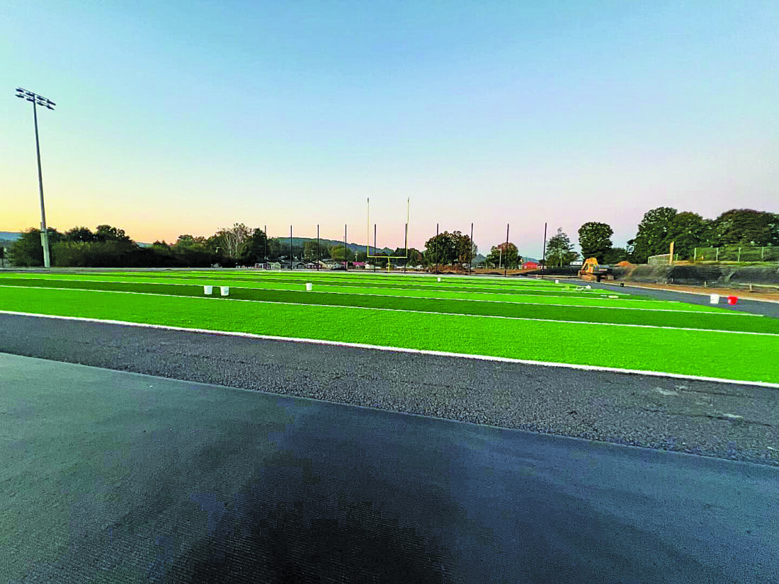 Construction on stadiums continues with turf installed | News, Sports ...